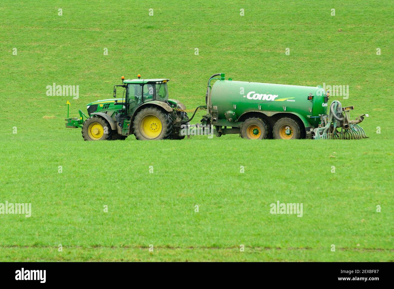 John deere tractor with slurry tanker hi-res stock photography and ...