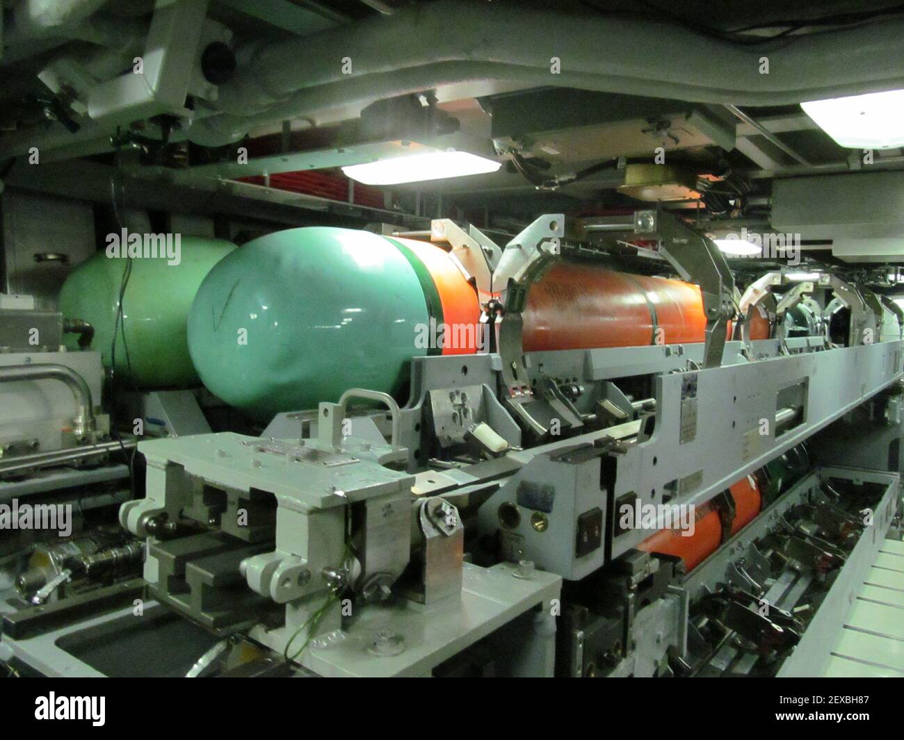 Two torpedoes aboard the hydraulic lifts used to insert them into the ...