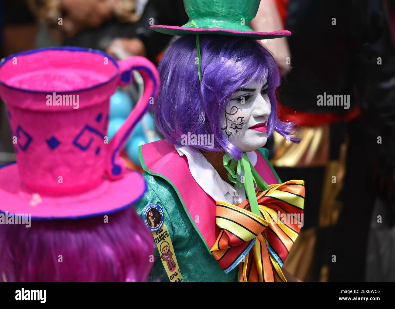 People with a disguise mask and colorful costumes participating at the ...