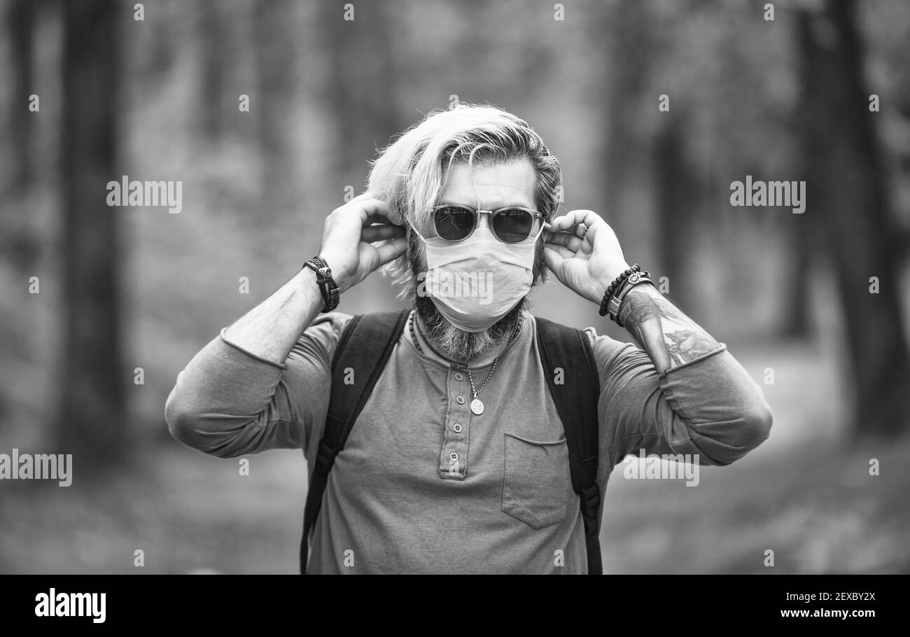 man protecting from air contamination or coronavirus covid-19 by ...