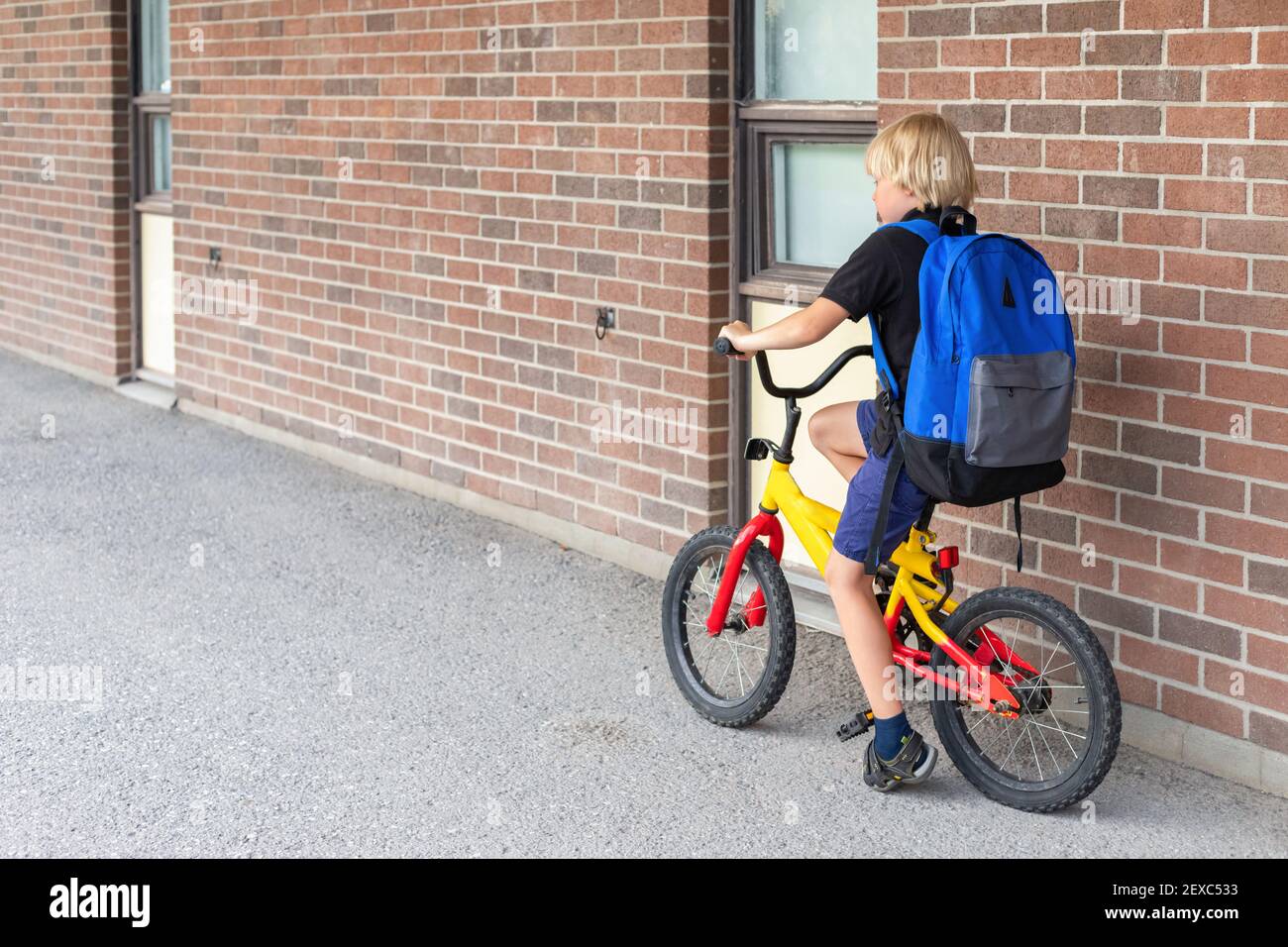 Kid Riding Bicycle To School
