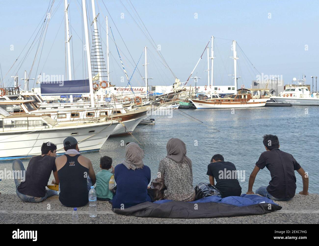 KOS, GREECE - SEPTEMBER 7, 2015 - Migrants at Kos harbor, on the Greek ...
