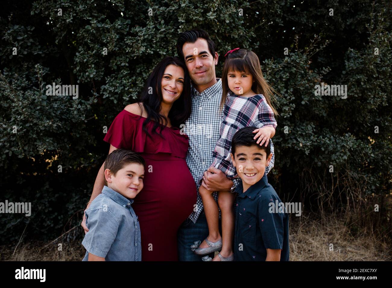 Family of Five Smiling for Camera in San Diego Stock Photo - Alamy