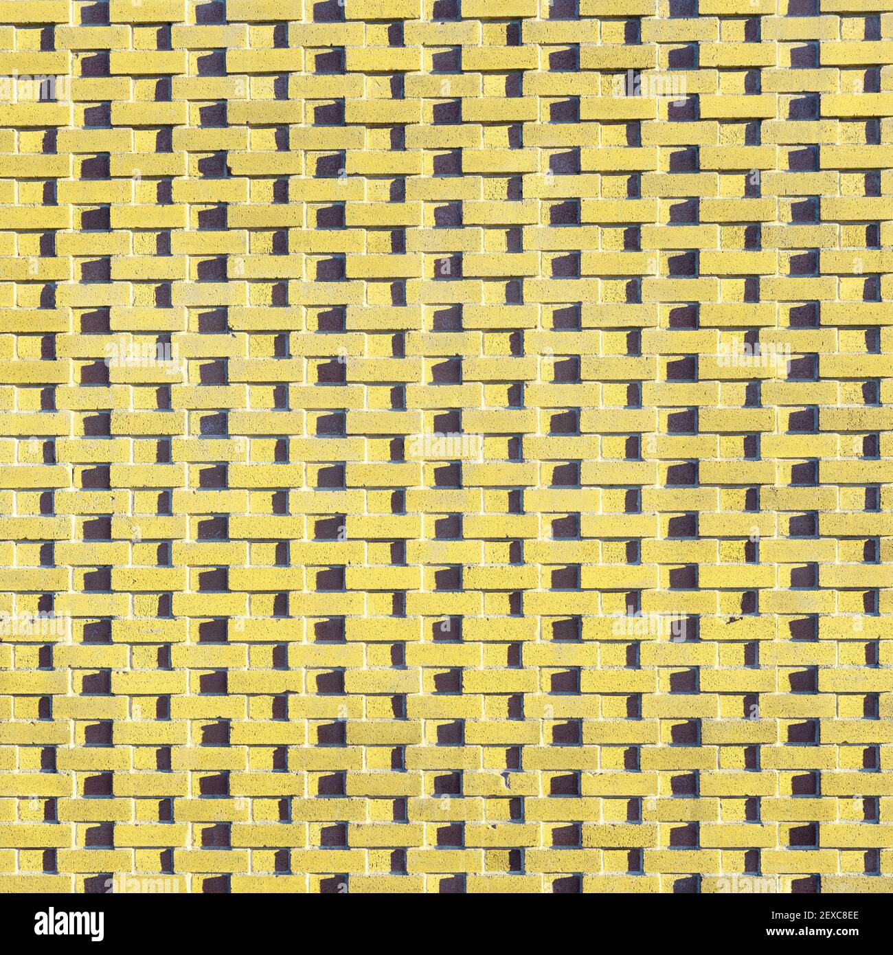 Yallow brick wall texture background. Colors of the year. Illuminating ...