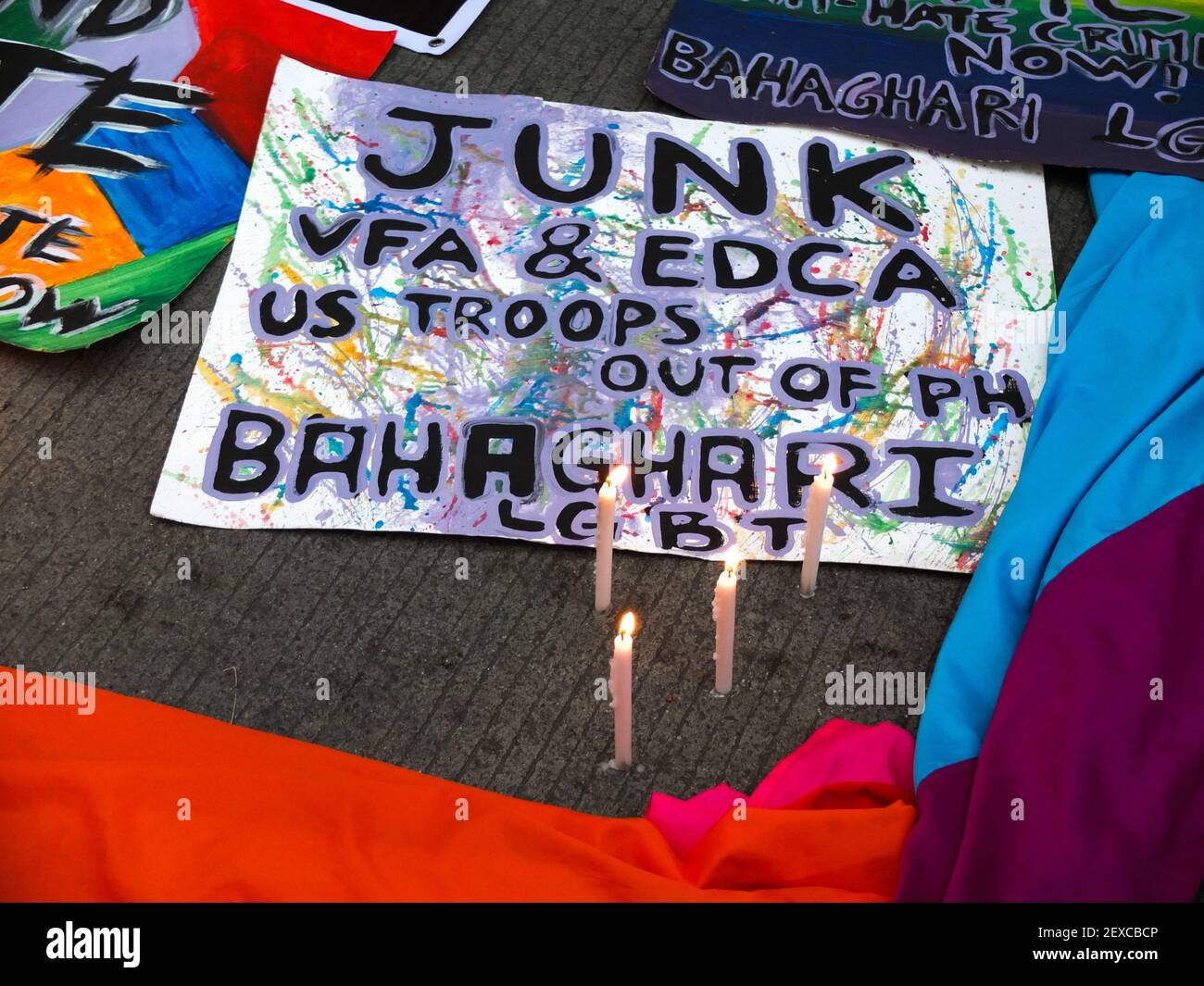 A placard with lighted candles highlighted the finale of the event. The ...