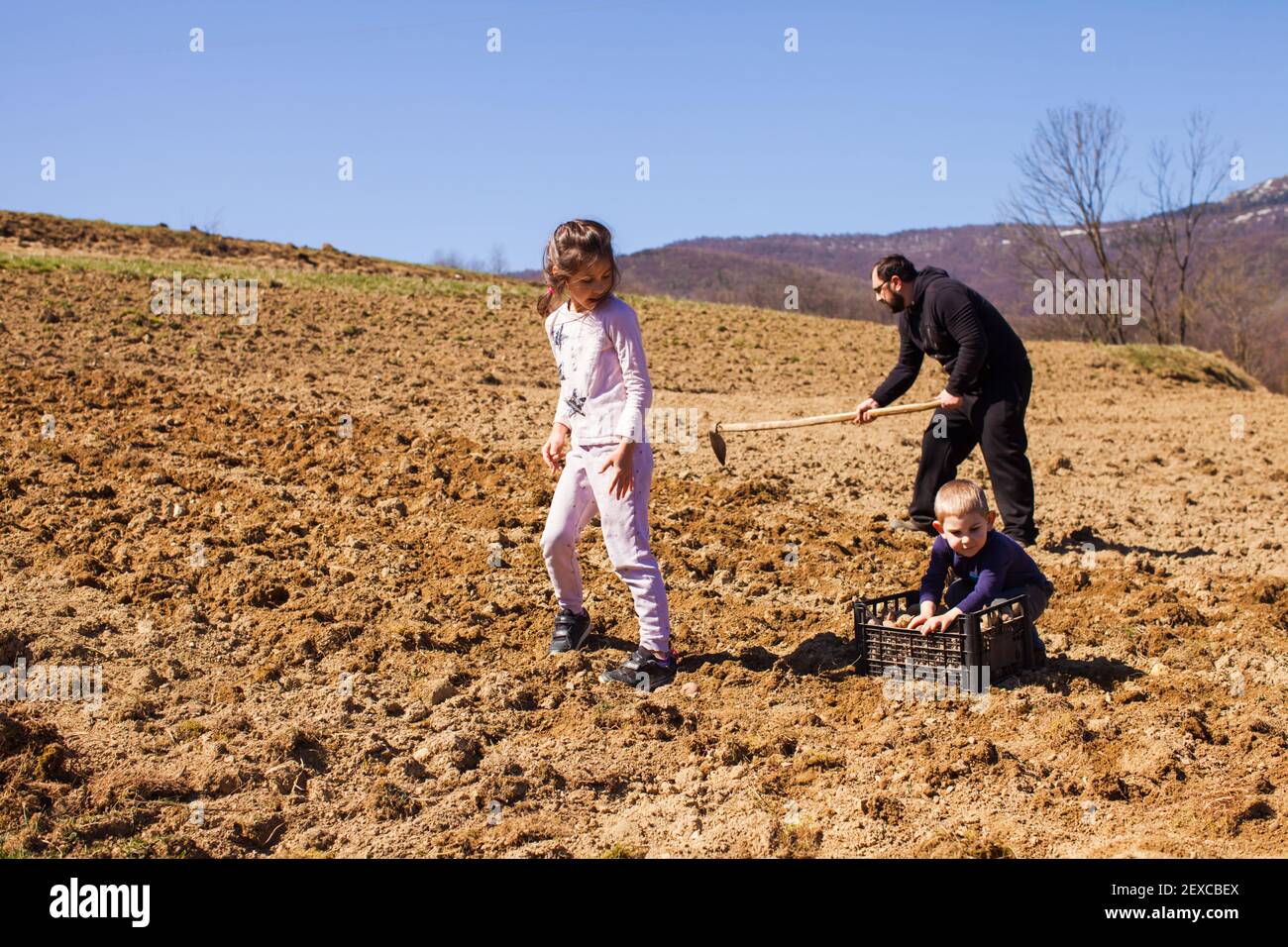 The help of little helpers is priceless Stock Photo - Alamy