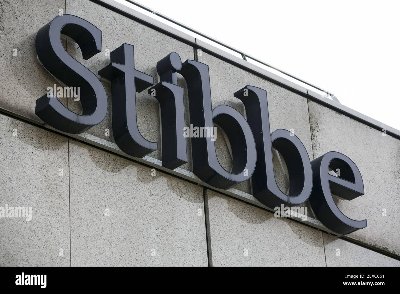 A logo sign outside of an office building occupied by Stibbe in ...