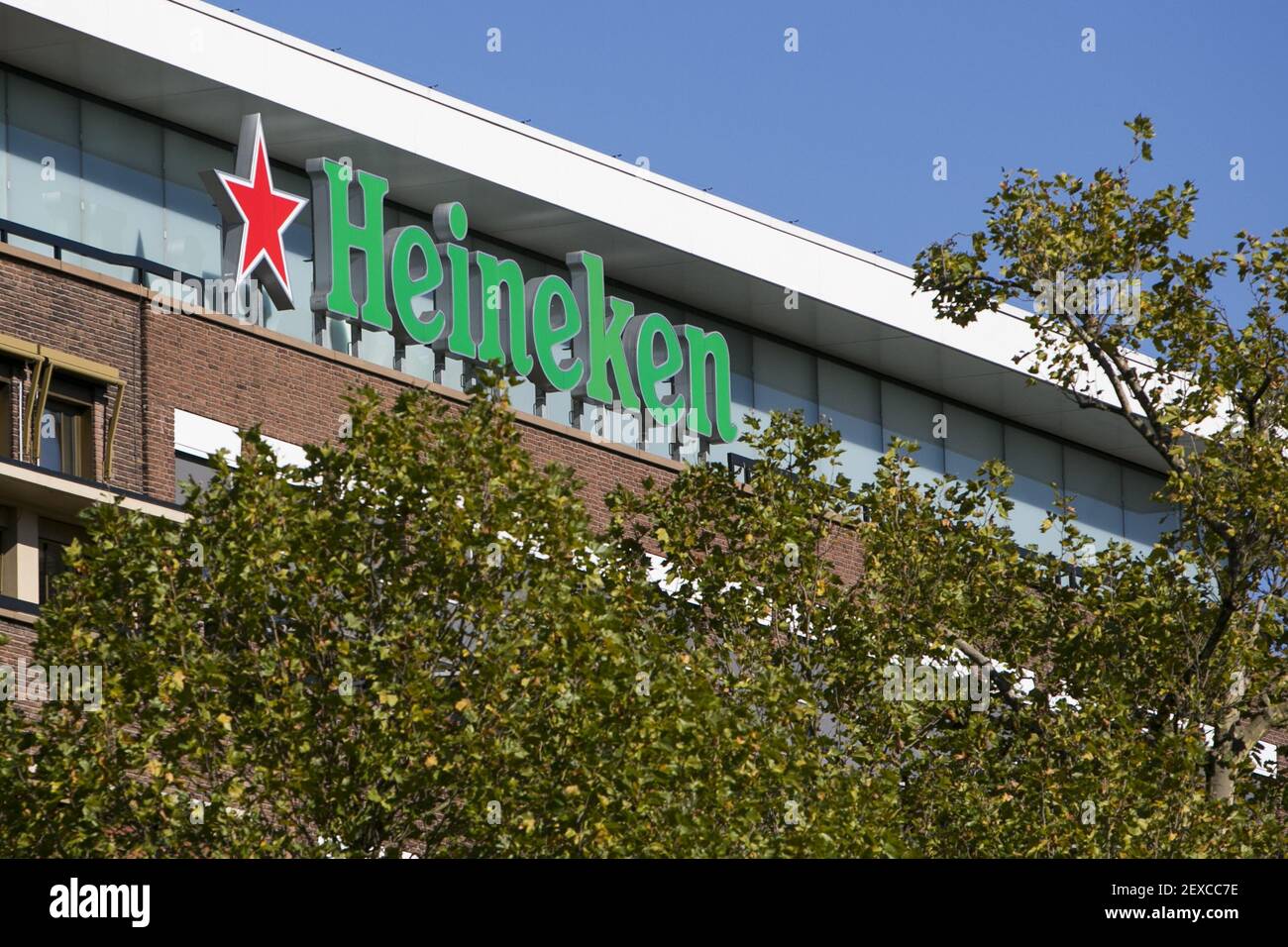 A logo sign outside of the headquarters of Heineken NV in Amsterdam ...