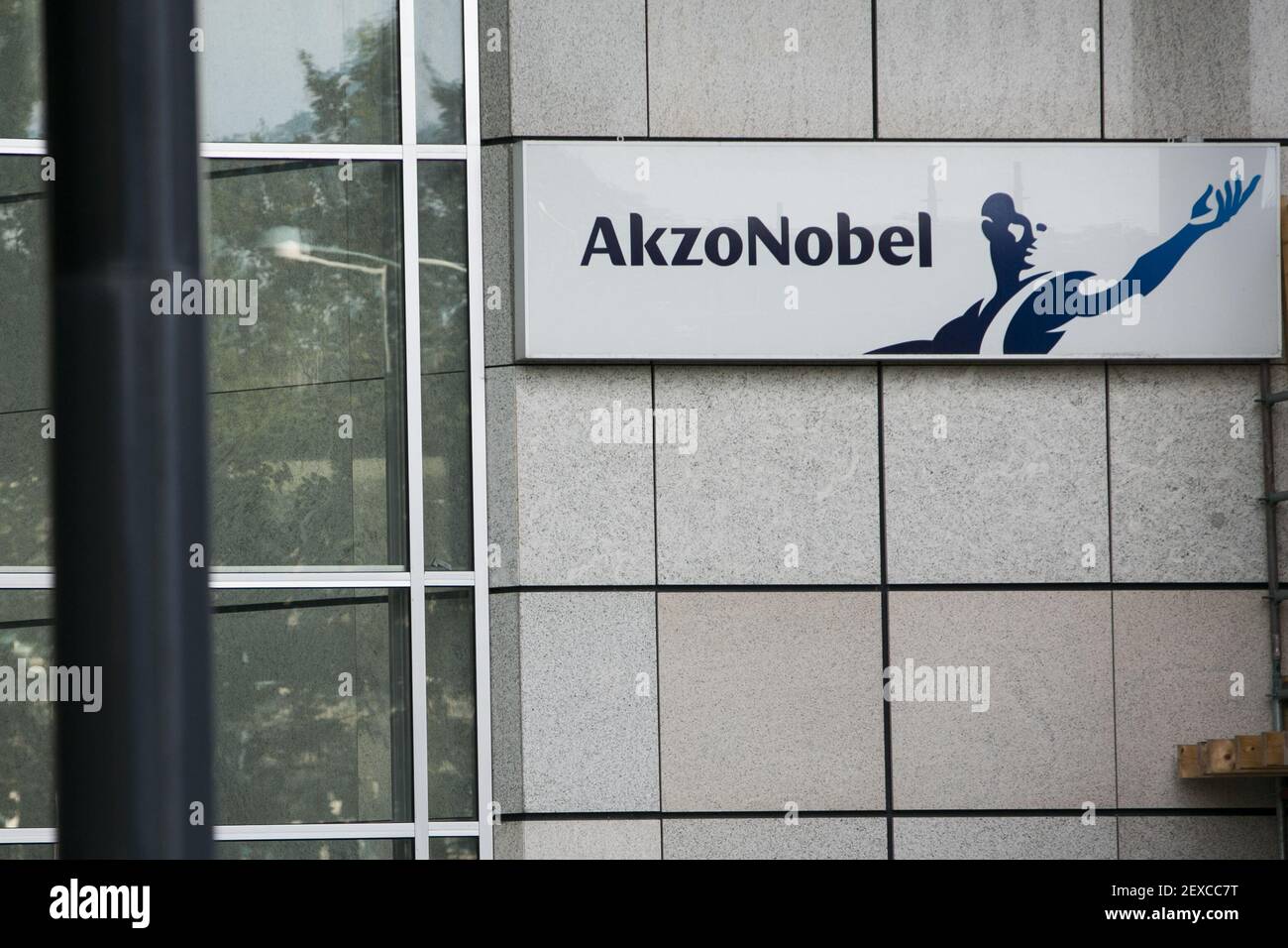 A logo sign outside of the headquarters of AkzoNobel in Amsterdam ...