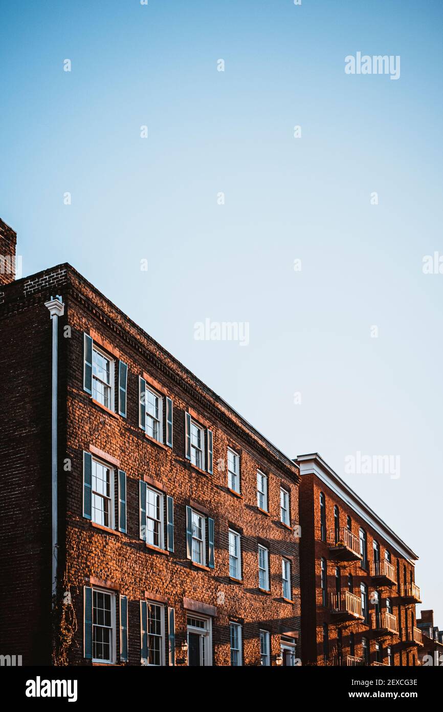 Brick building facade catch morning light, downtown Savannah, Georgia ...