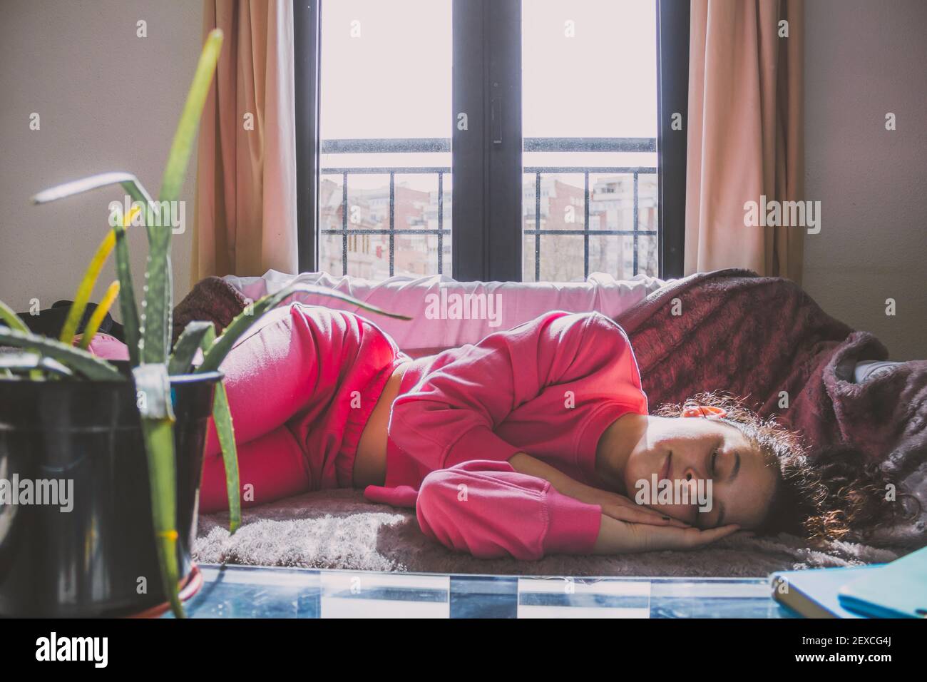 young woman napping on the sofa Stock Photo - Alamy