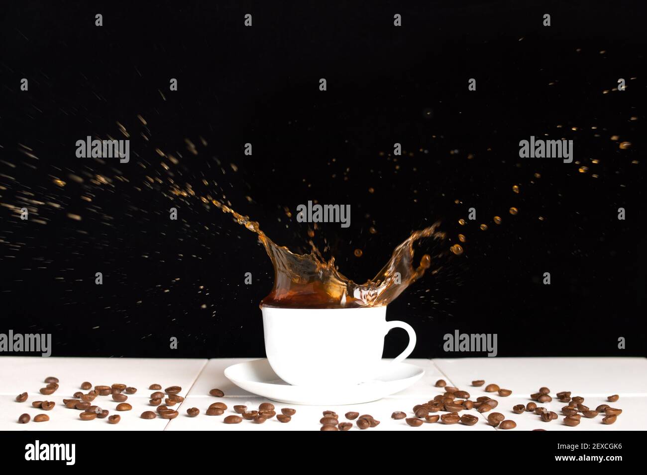 cup of coffee and coffee splash Stock Photo - Alamy