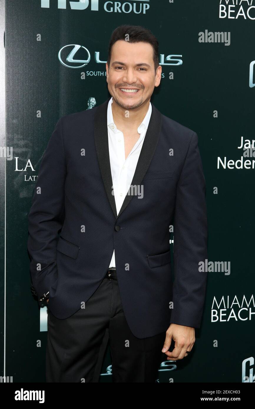MIAMI BEACH,FL - OCT 15: Victor Manuelle arrives at the Latin ...
