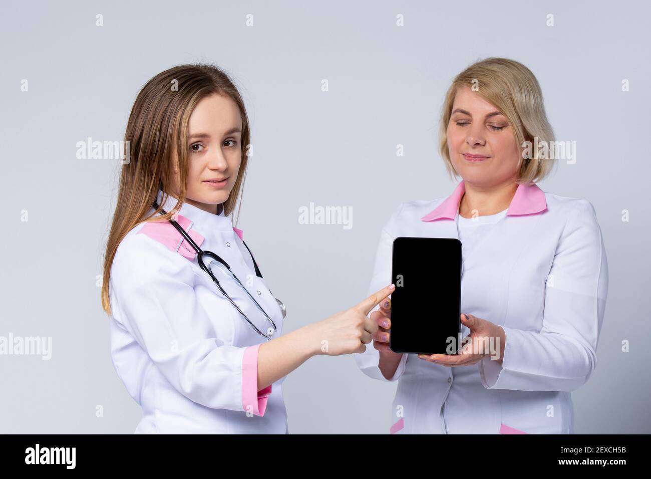 Happy women, professional nurses, female doctors wear white uniform ...