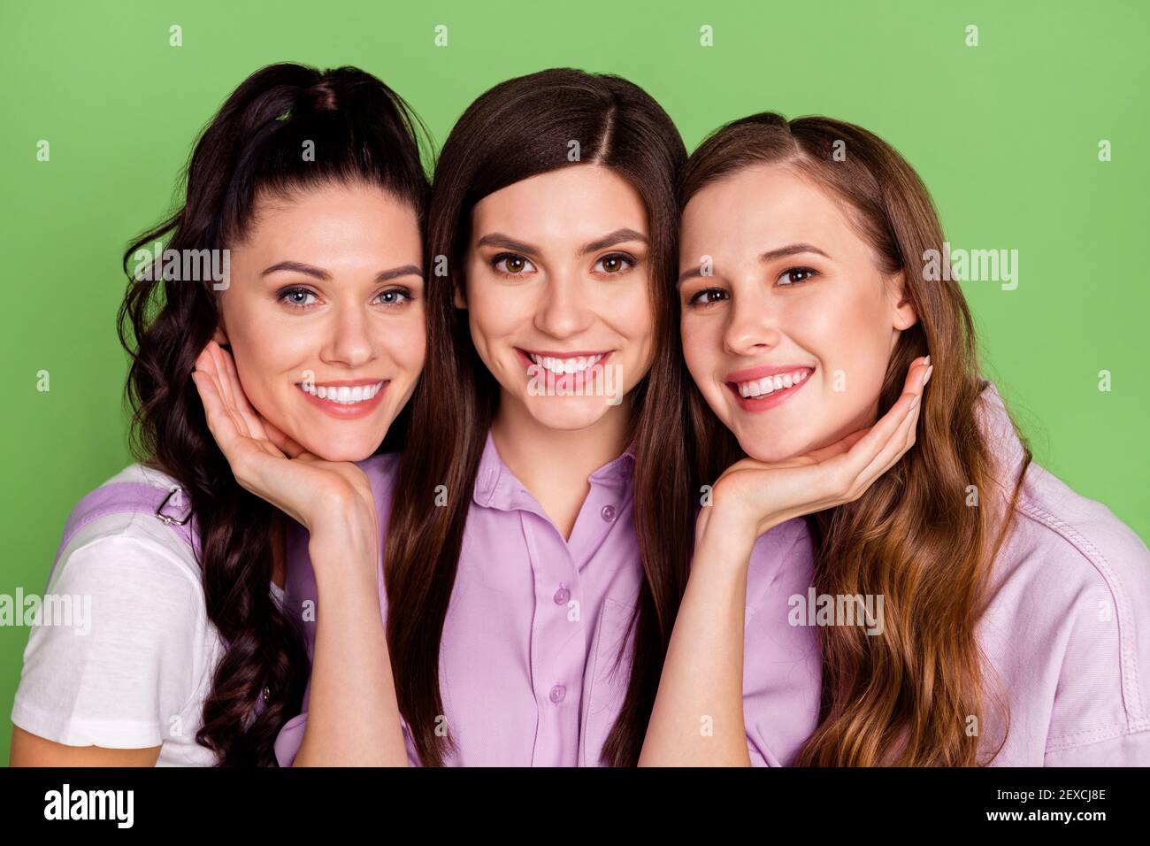 Photo of three young charming girls happy positive toothy smile friends ...