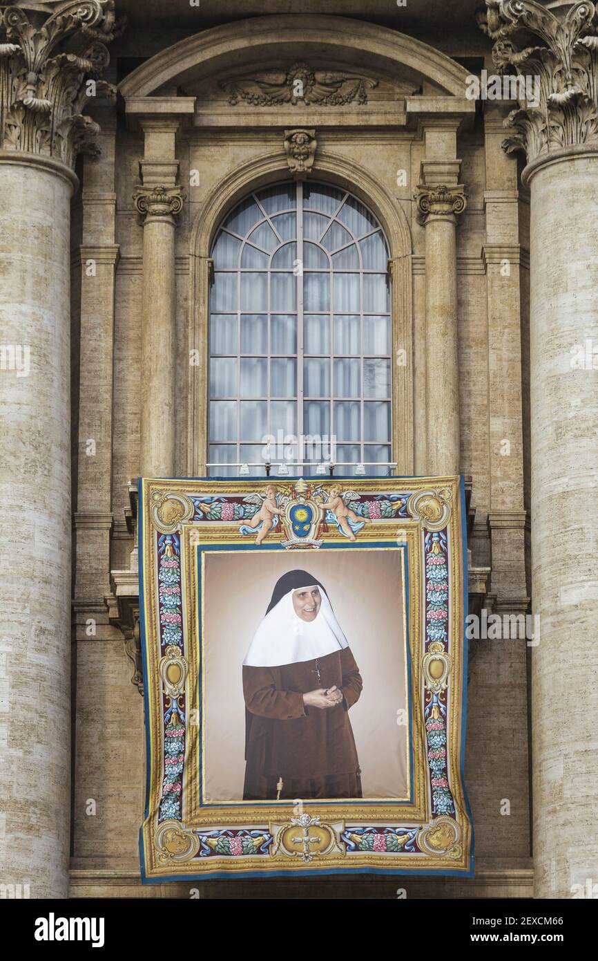A tapestry showing Mary of the Immaculate Conception hang from the ...