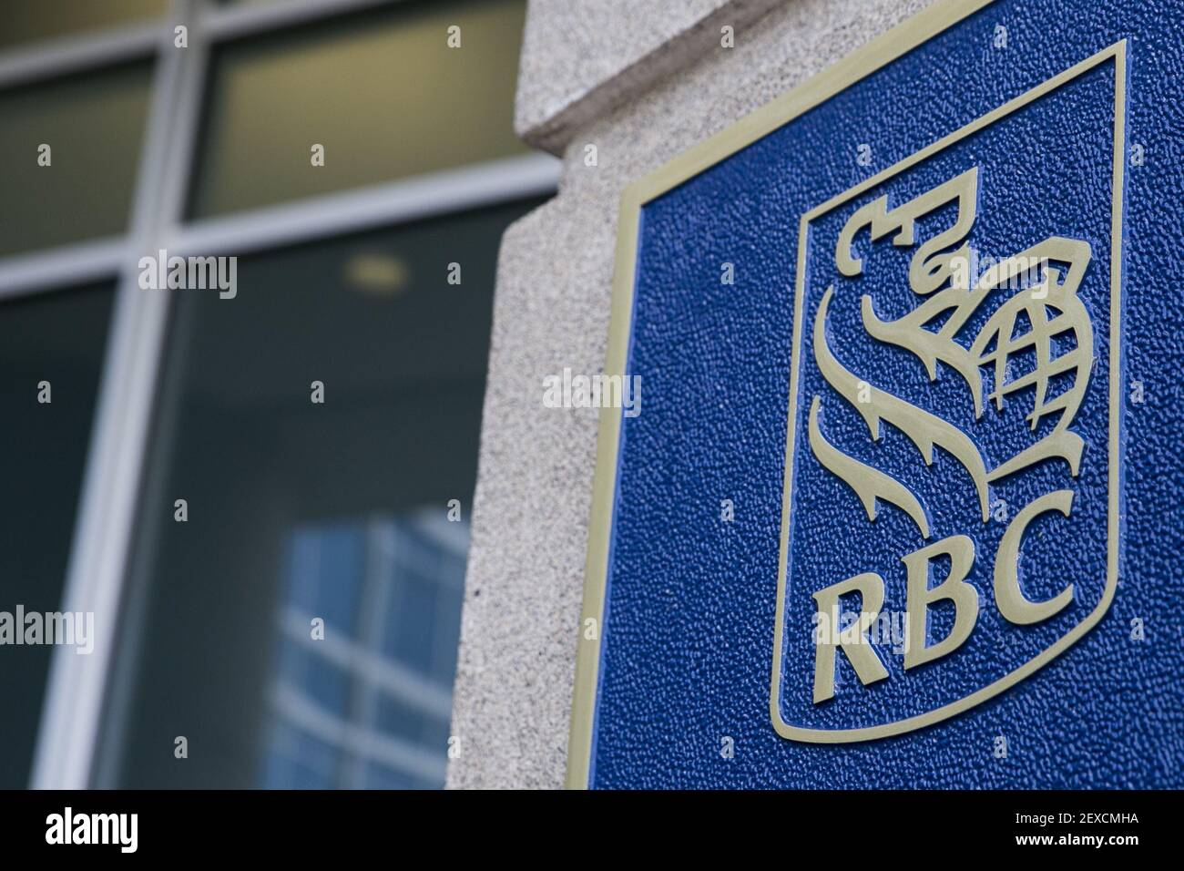 A logo sign outside of an office building occupied by Royal Bank Of ...