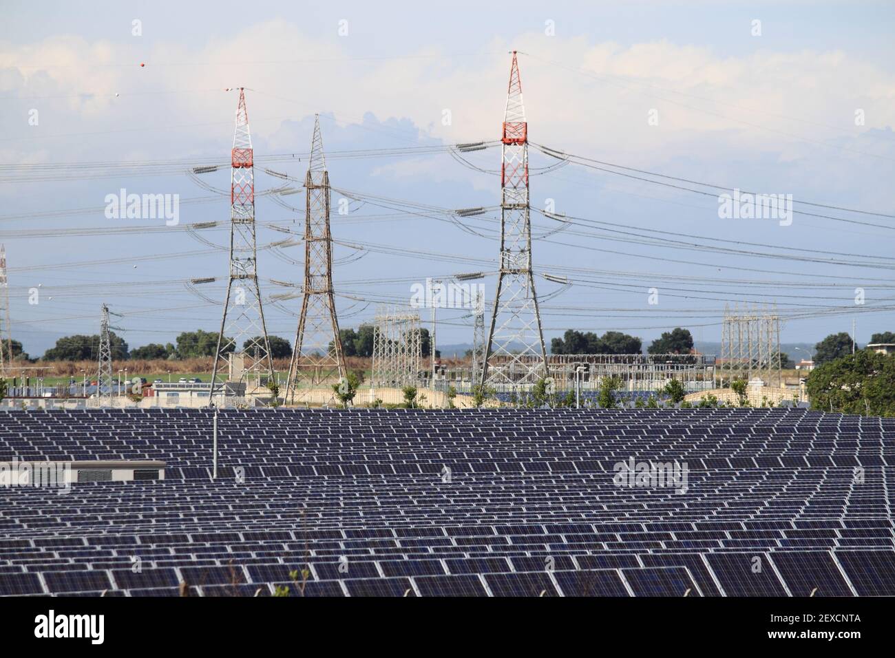 Power plant using renewable solar energy with power line towers in ...