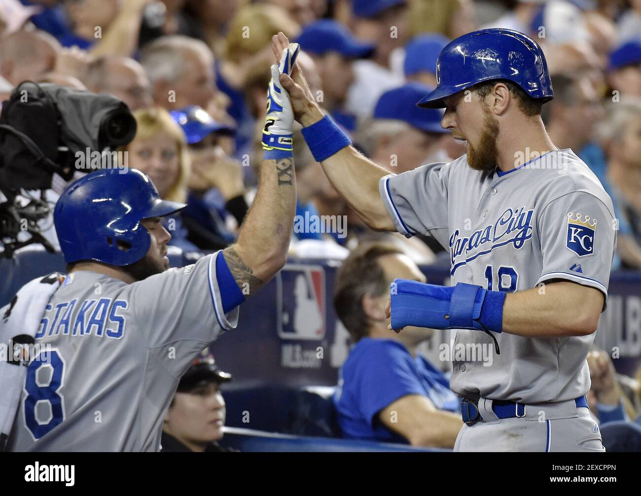 The Kansas City Royals' Mike Moustakas (8) congratulates Ben Zobrist ...