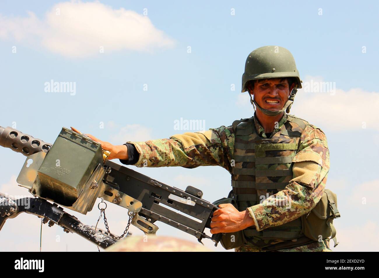 An Afghan National Army soldier from 201 Corps demonstrates his ...
