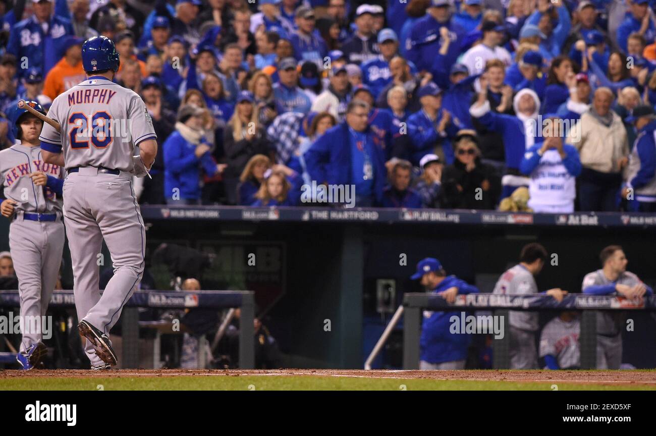 The New York Mets' Daniel Murphy (28) strikes out in the first inning ...