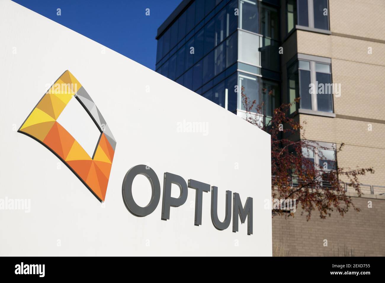 A logo sign outside of the headquarters of Optum in Eden Prairie ...