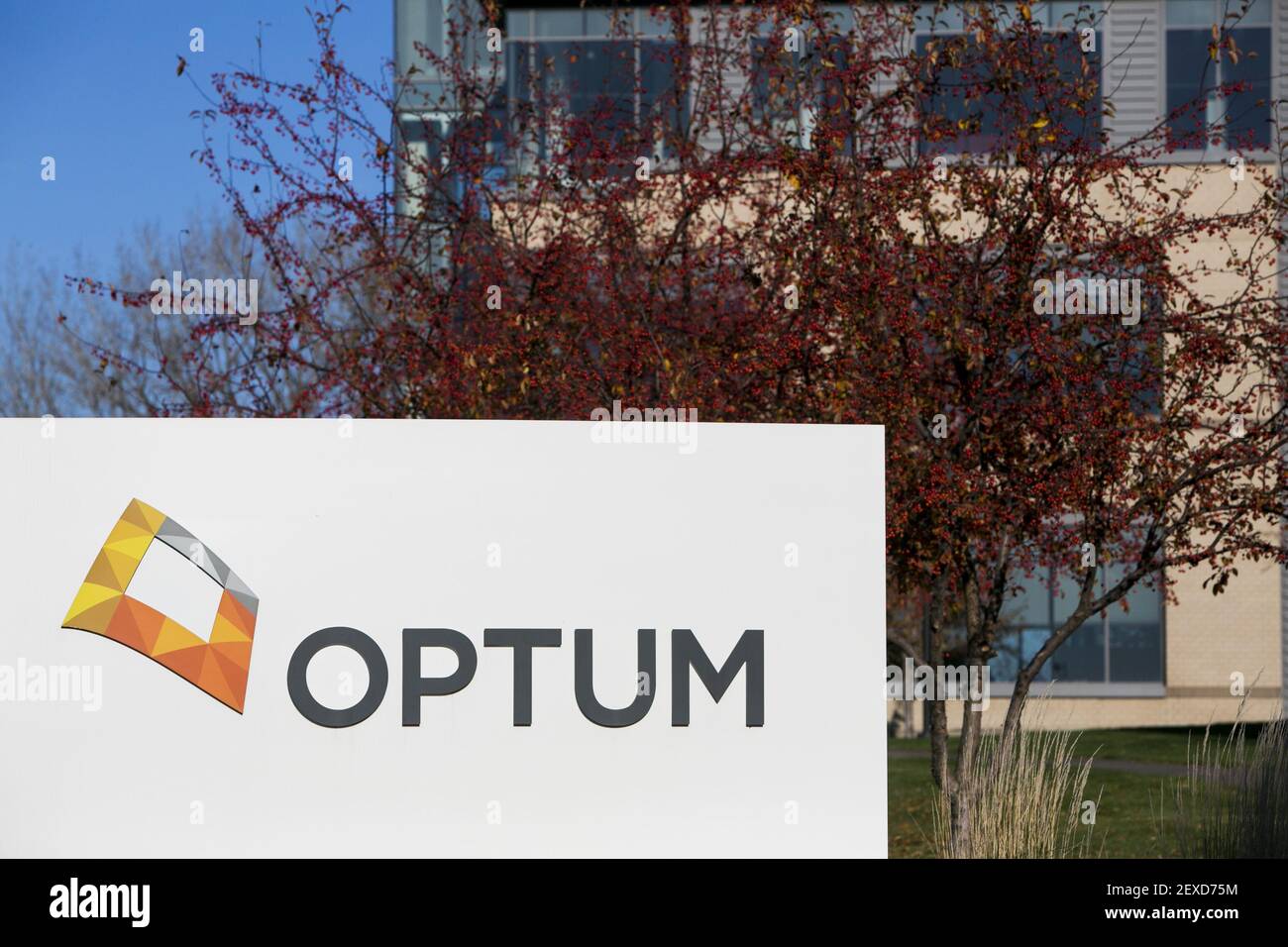A logo sign outside of the headquarters of Optum in Eden Prairie ...