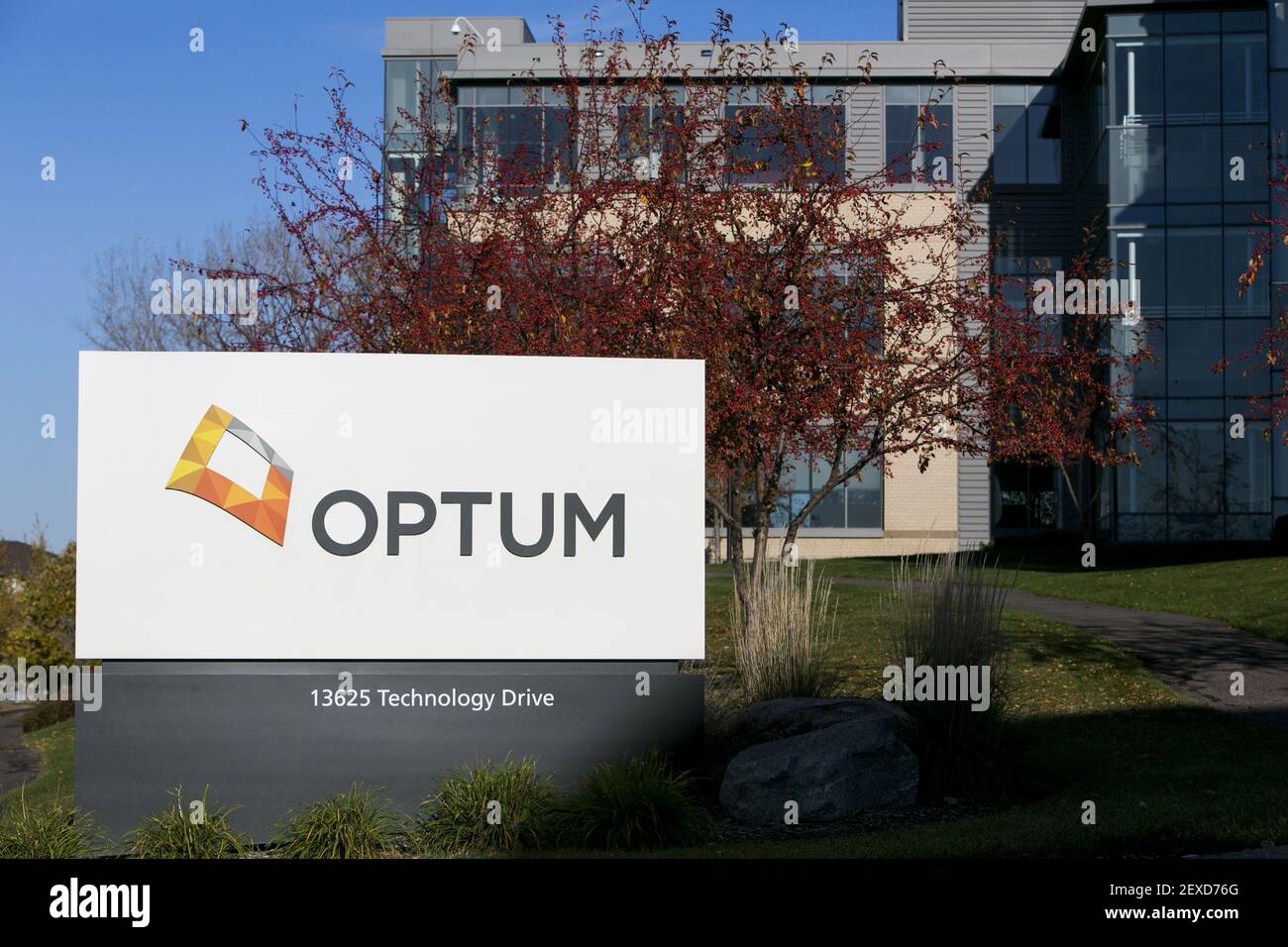 A logo sign outside of the headquarters of Optum in Eden Prairie ...