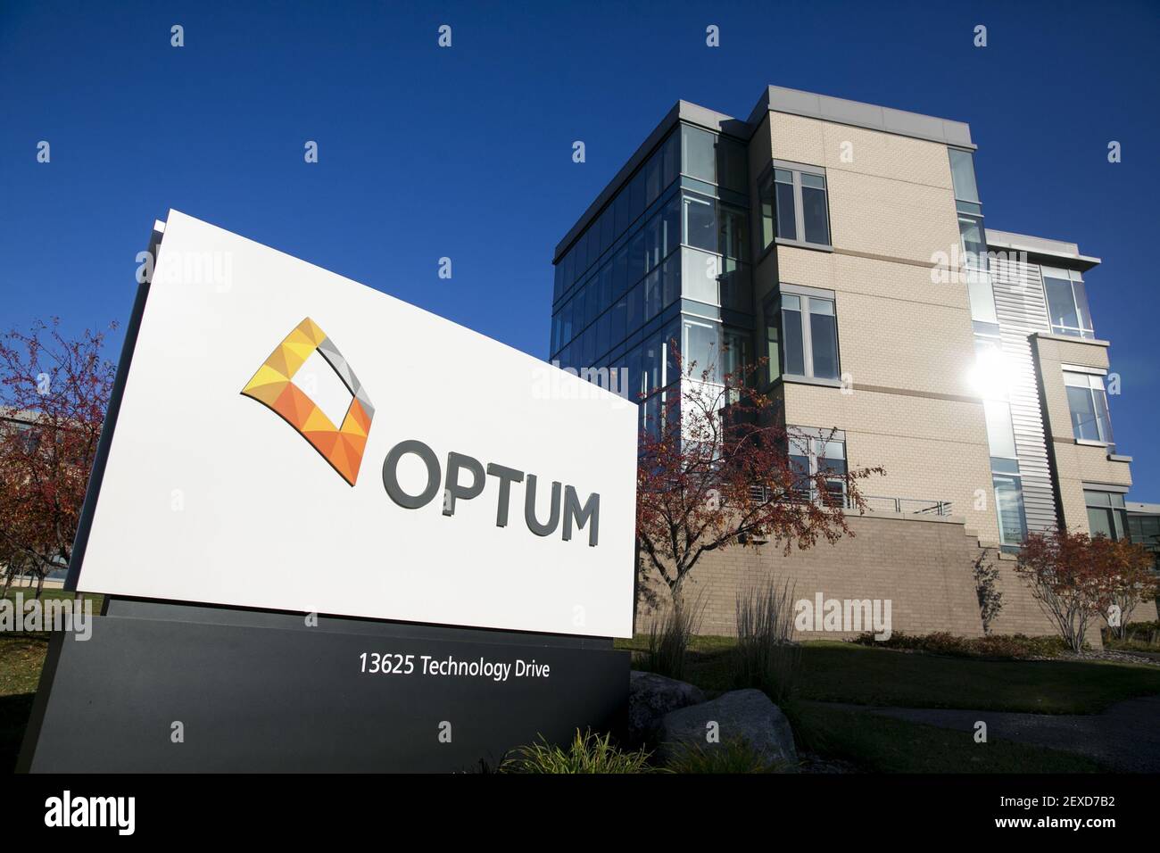 A logo sign outside of the headquarters of Optum in Eden Prairie ...