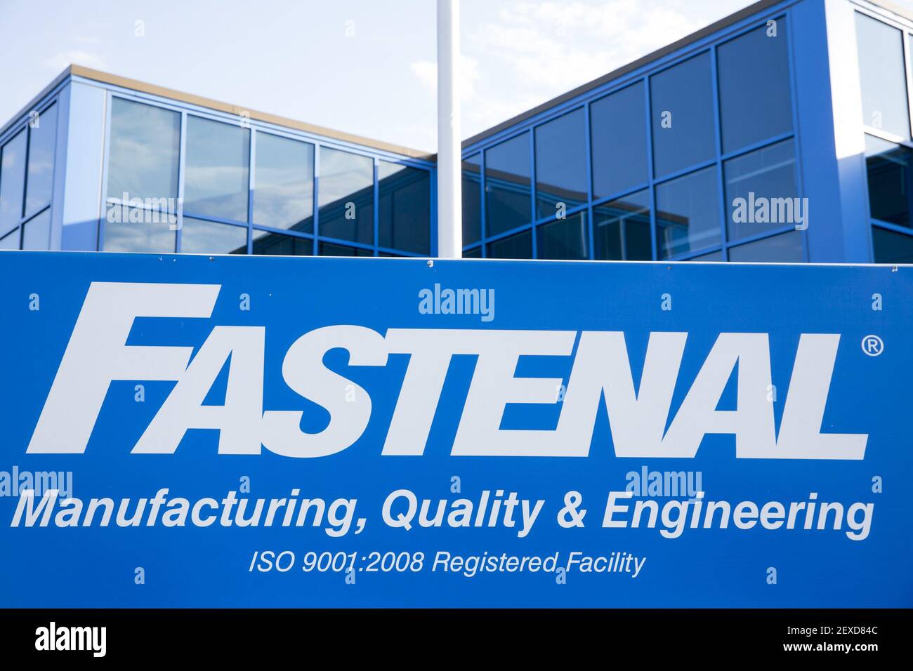 A logo sign outside of the headquarters of the Fastenal Company in ...