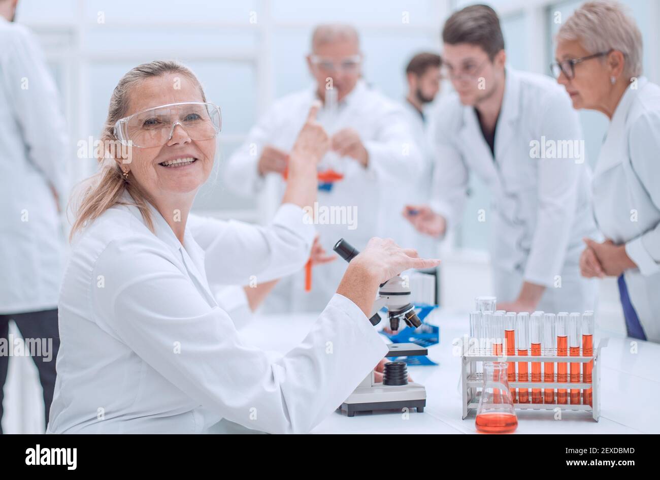 Senior woman microscope scientist hi-res stock photography and images ...