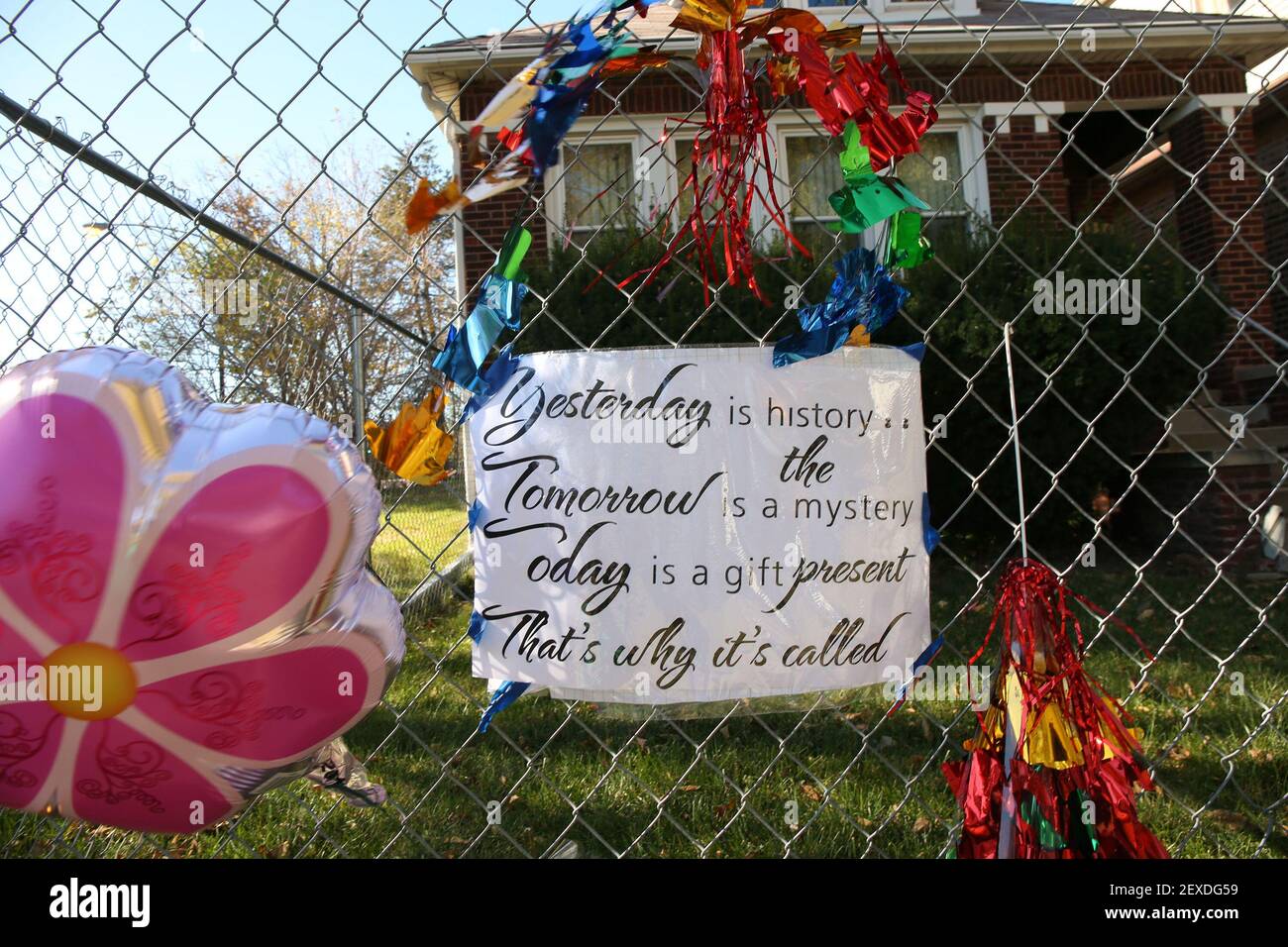 A collection of balloons and stuffed animals at 7356 S. May where 20 yr ...