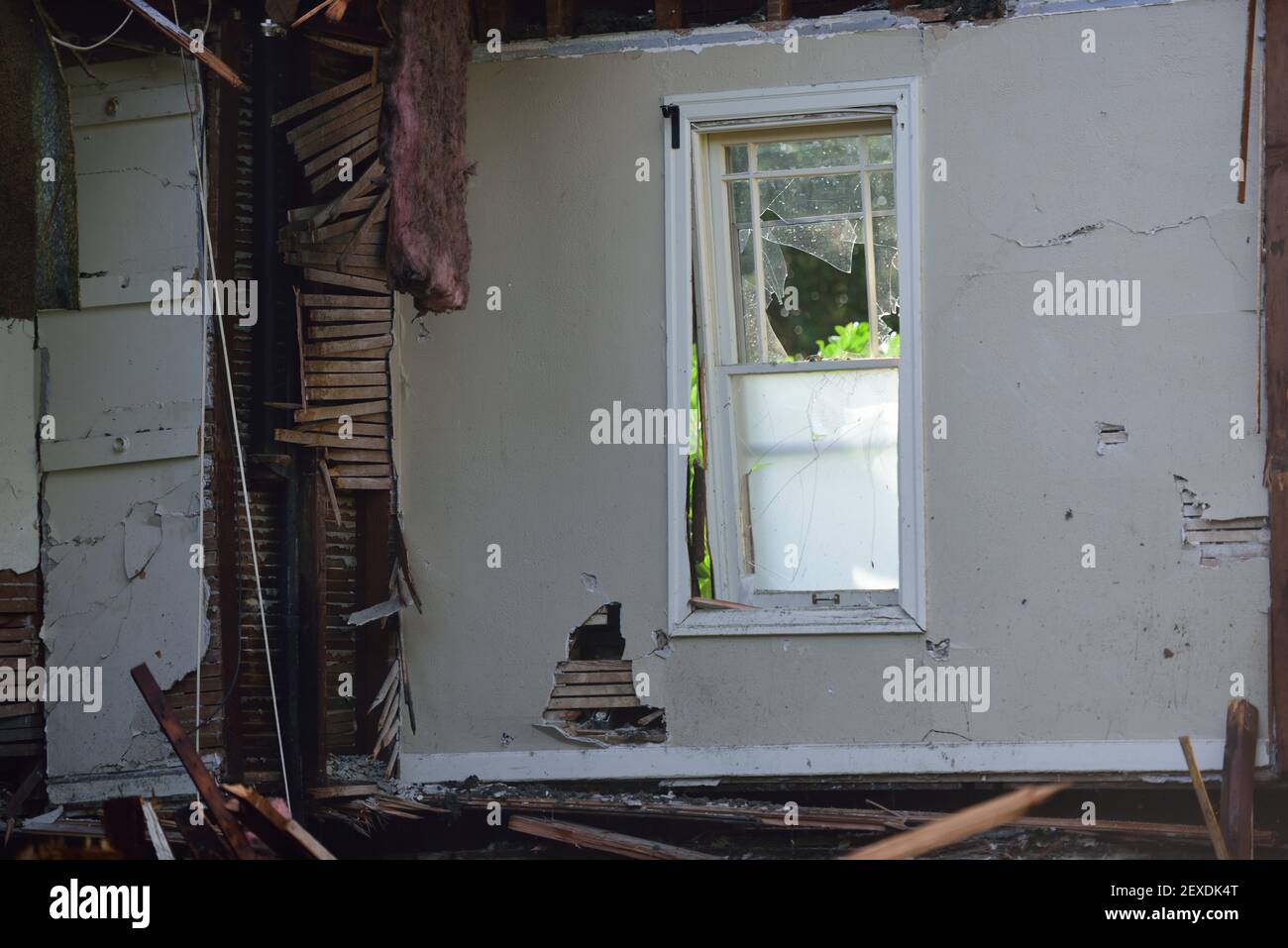 A demolition crew with Dan Riehl Excavating tears down a house at 633 ...
