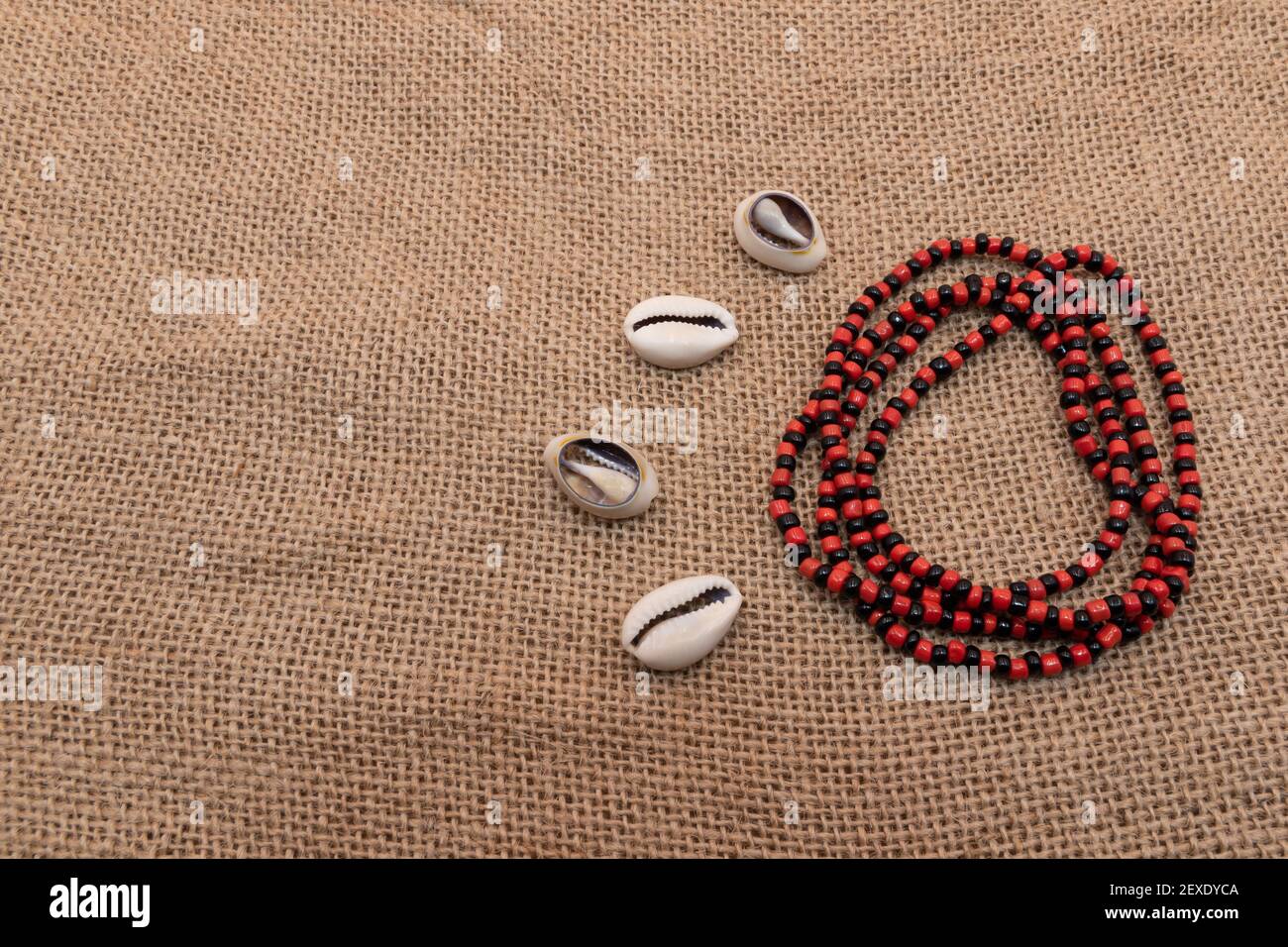 Photograph of the representative necklace of the Orisha Eleggua and ...