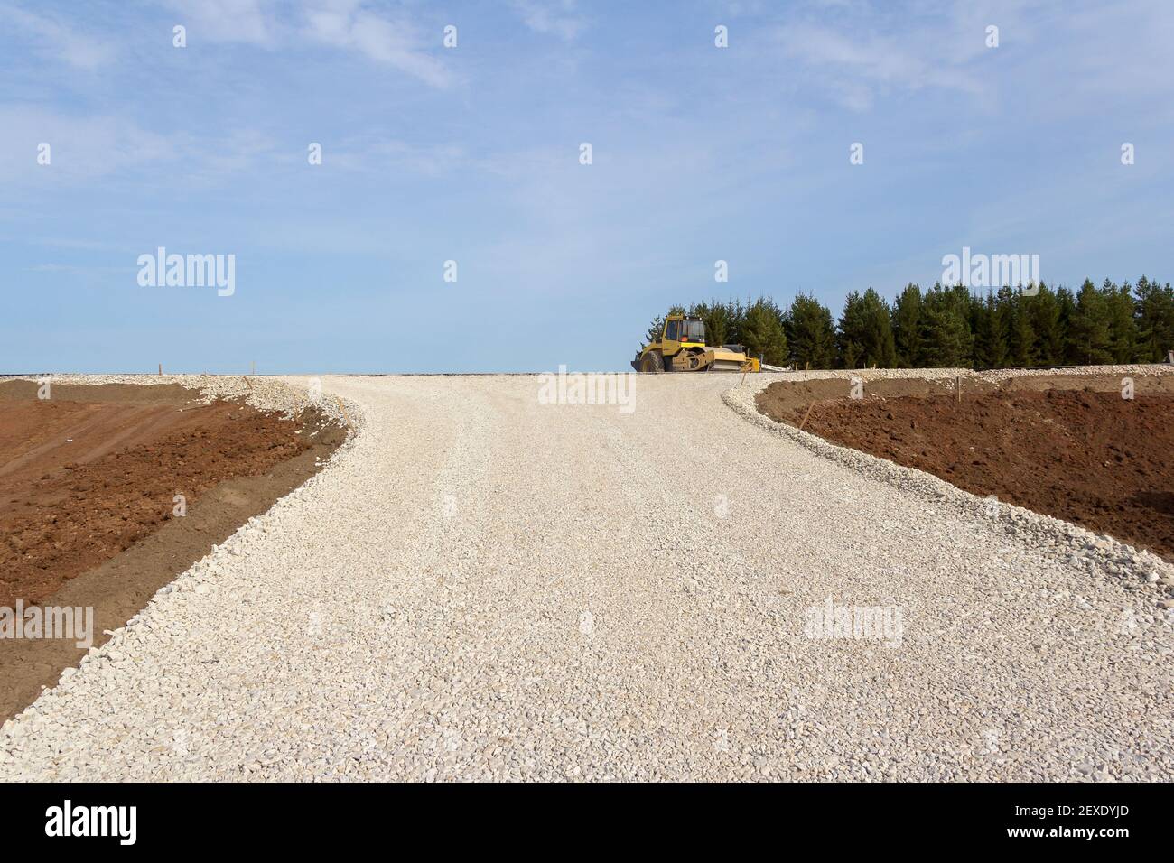 Construction of a new road. Construction stage. Road pavement layers ...