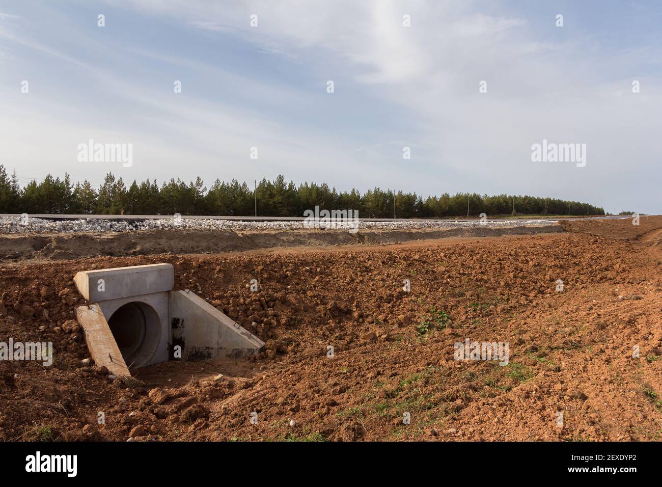 Small concrete bridge across the road. A bridge across a road for a ...