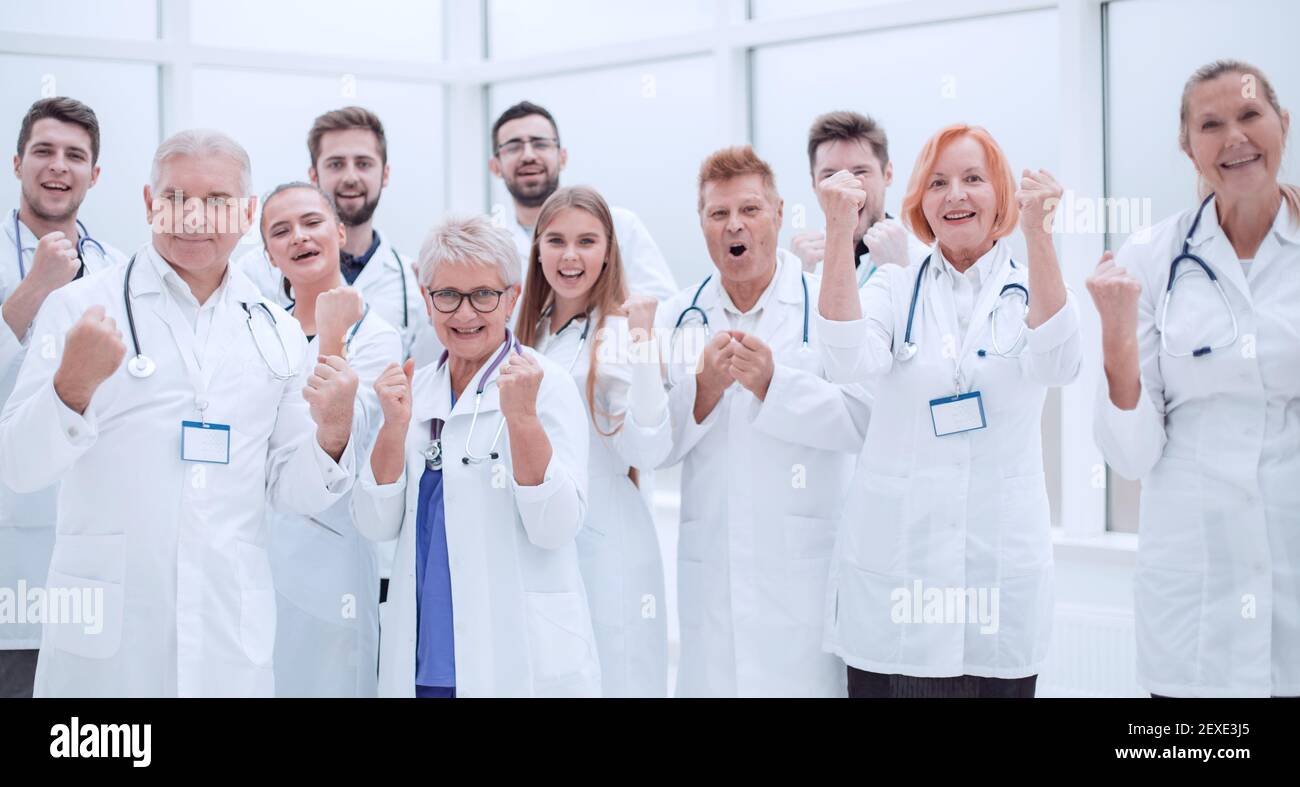 close up. large group of doctors showing their success Stock Photo - Alamy
