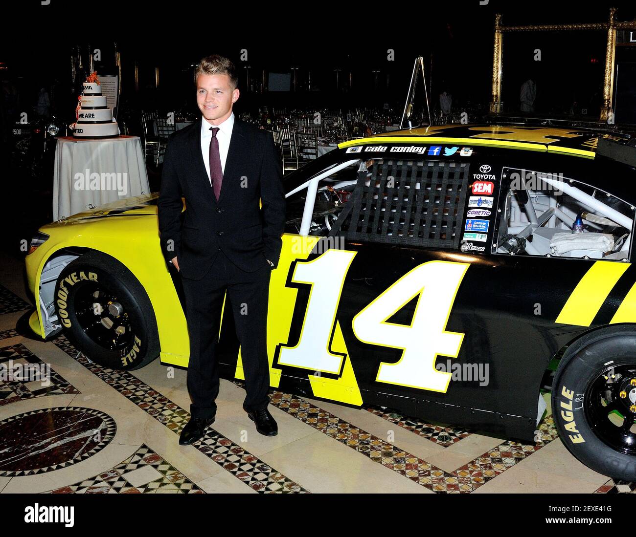 NASCAR driver Cale Conley stands by his car at the IAVA Heroes Gala at ...