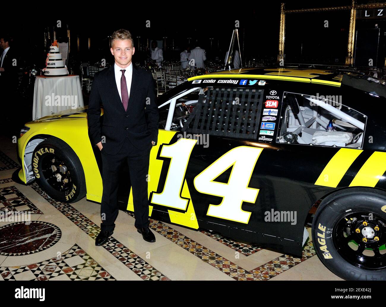 NASCAR driver Cale Conley stands by his car at the IAVA Heroes Gala at ...