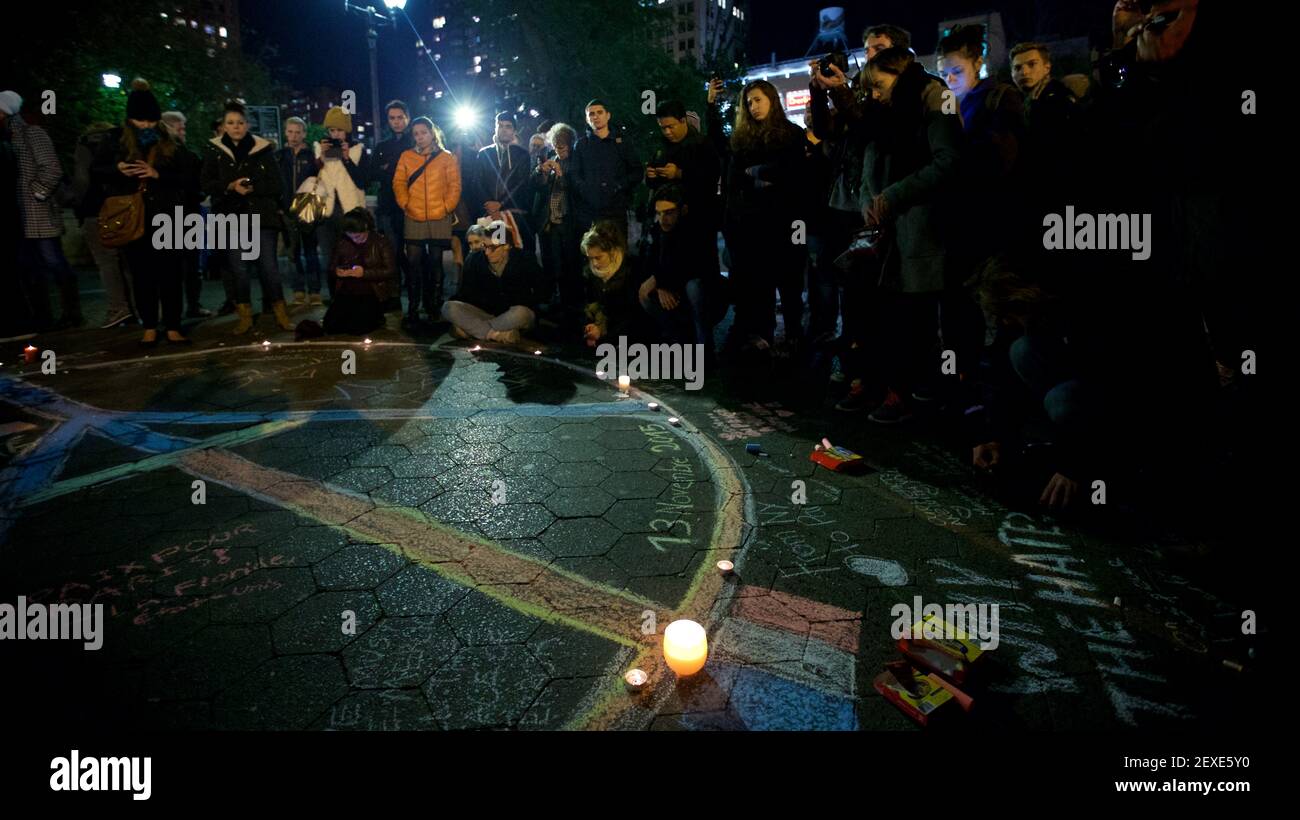 People light candles and gather in Union Square in NYC to show ...