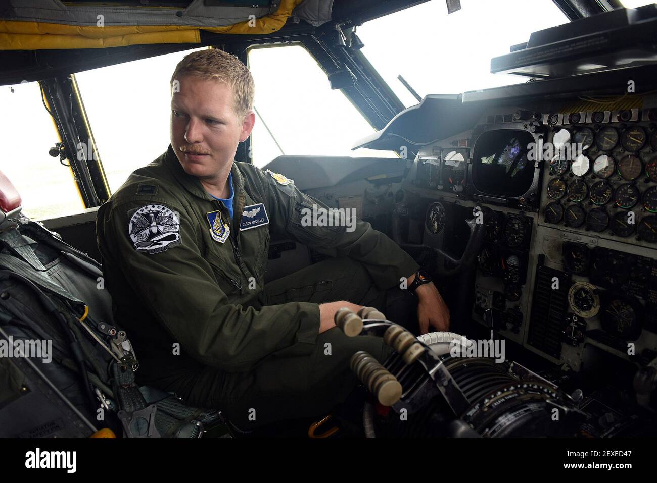 Aircraft commander Capt. Jason McCulley sits in the cockpit of a B-52 ...
