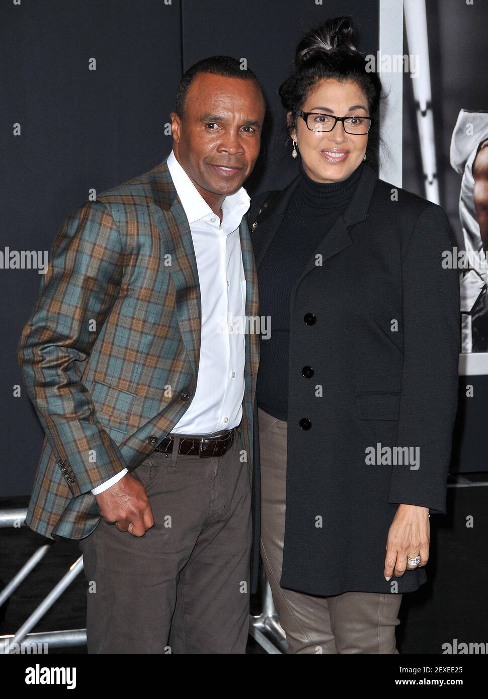 (L-R) Sugar Ray Leonard and wife Bernadette Robi arrives at the "Creed ...
