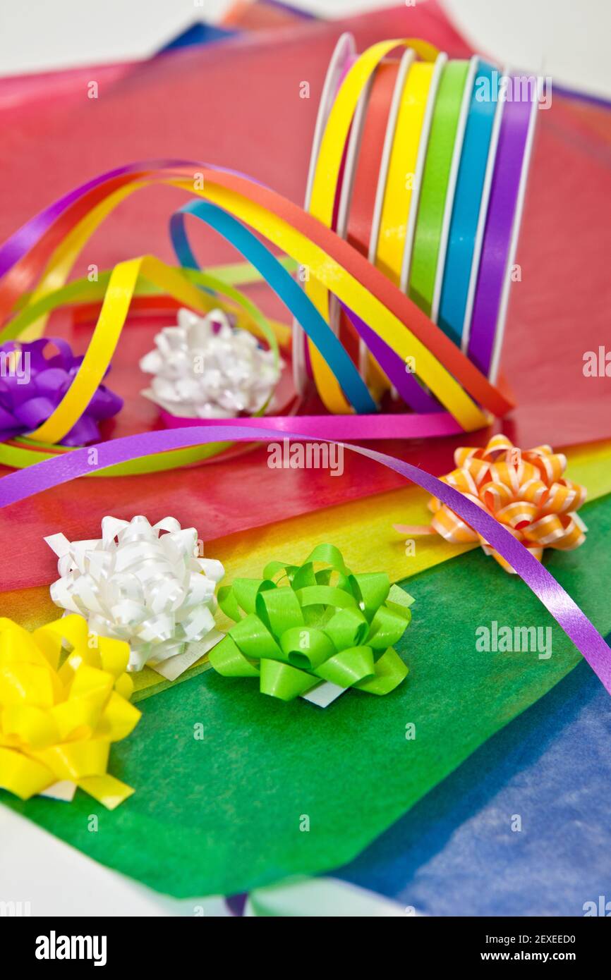 Colorful ribbons and wrapping paper Stock Photo - Alamy