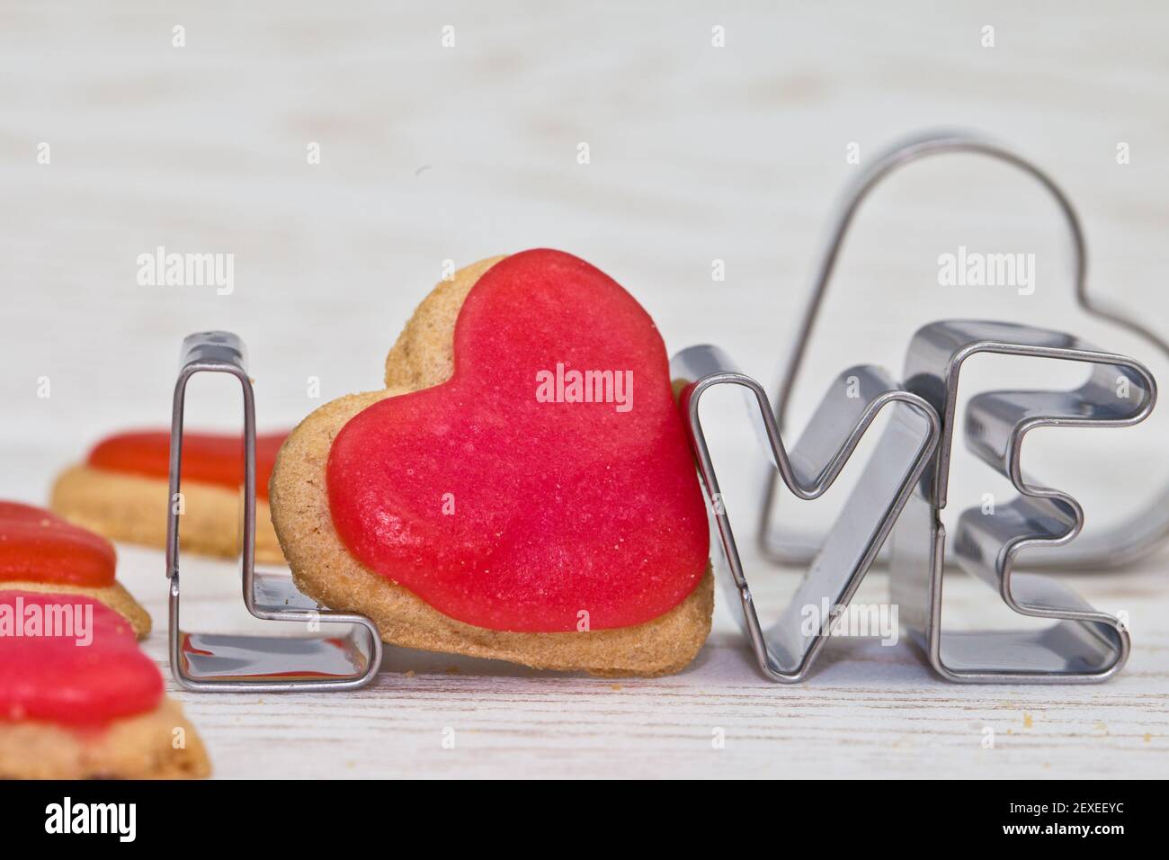 Love written with cookie shapes Stock Photo - Alamy