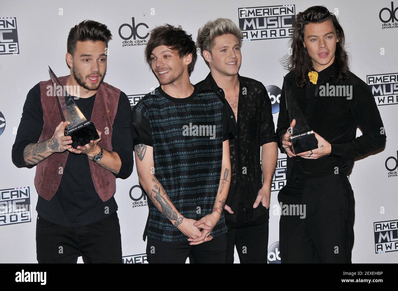 (L-R) One Direction - Liam Payne, Louis Tomlinson, Niall Horan and Harry Styles backstage at the ...