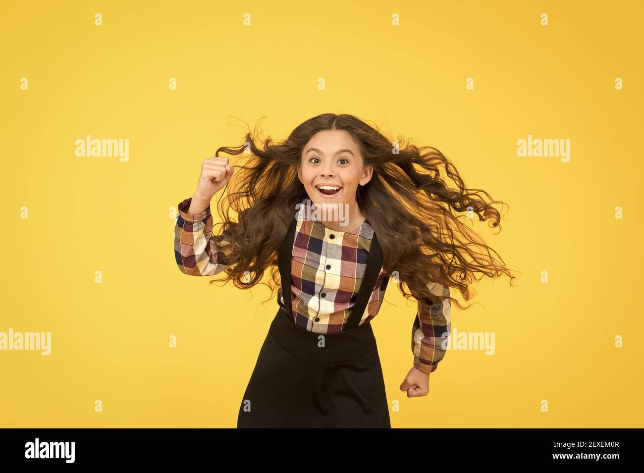 Air in her hair. natural beauty. Girl kid long hair flying in air ...