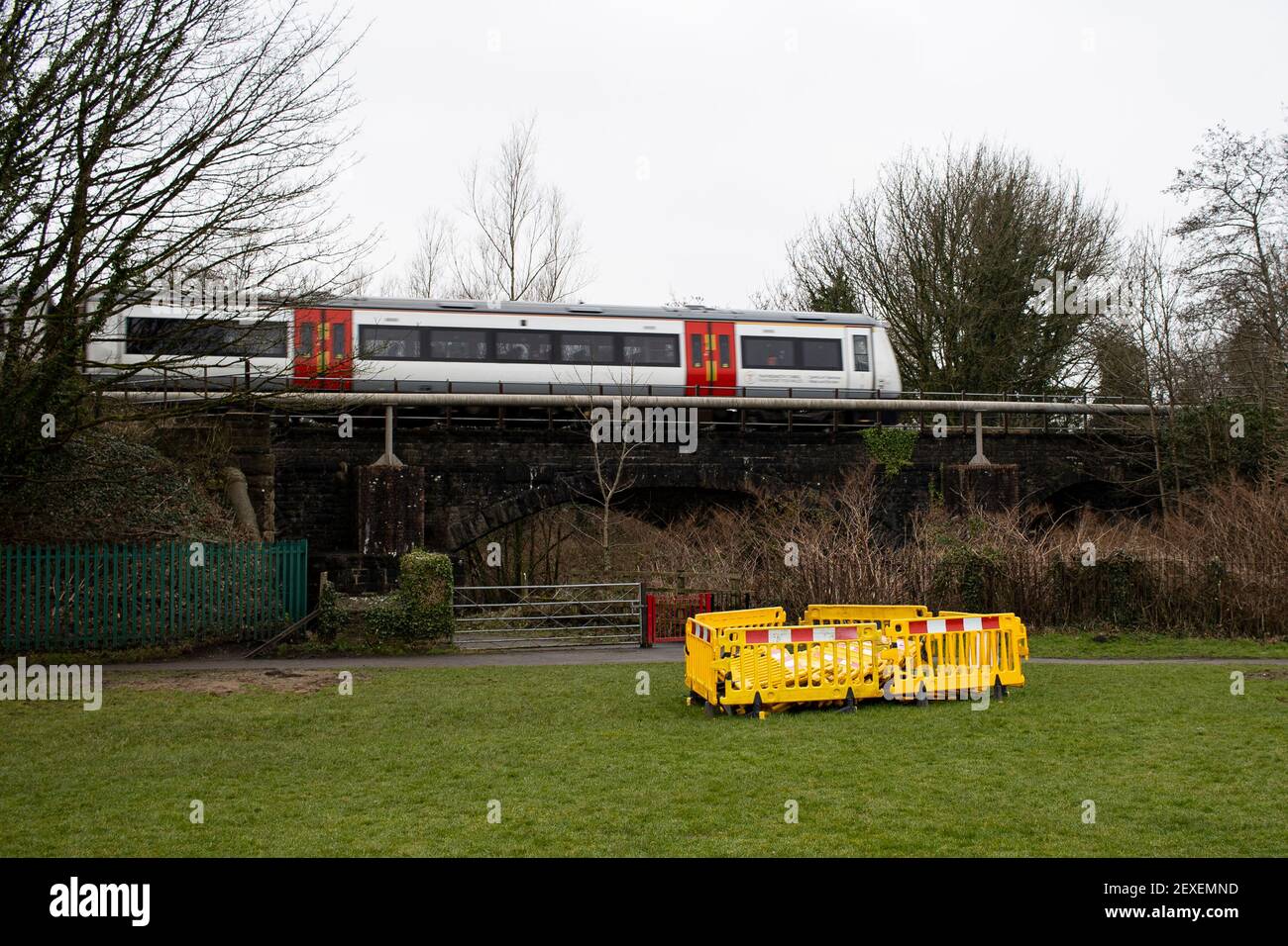 A Transport for Wales train crosses the Llynfi River at Pandy Park ...