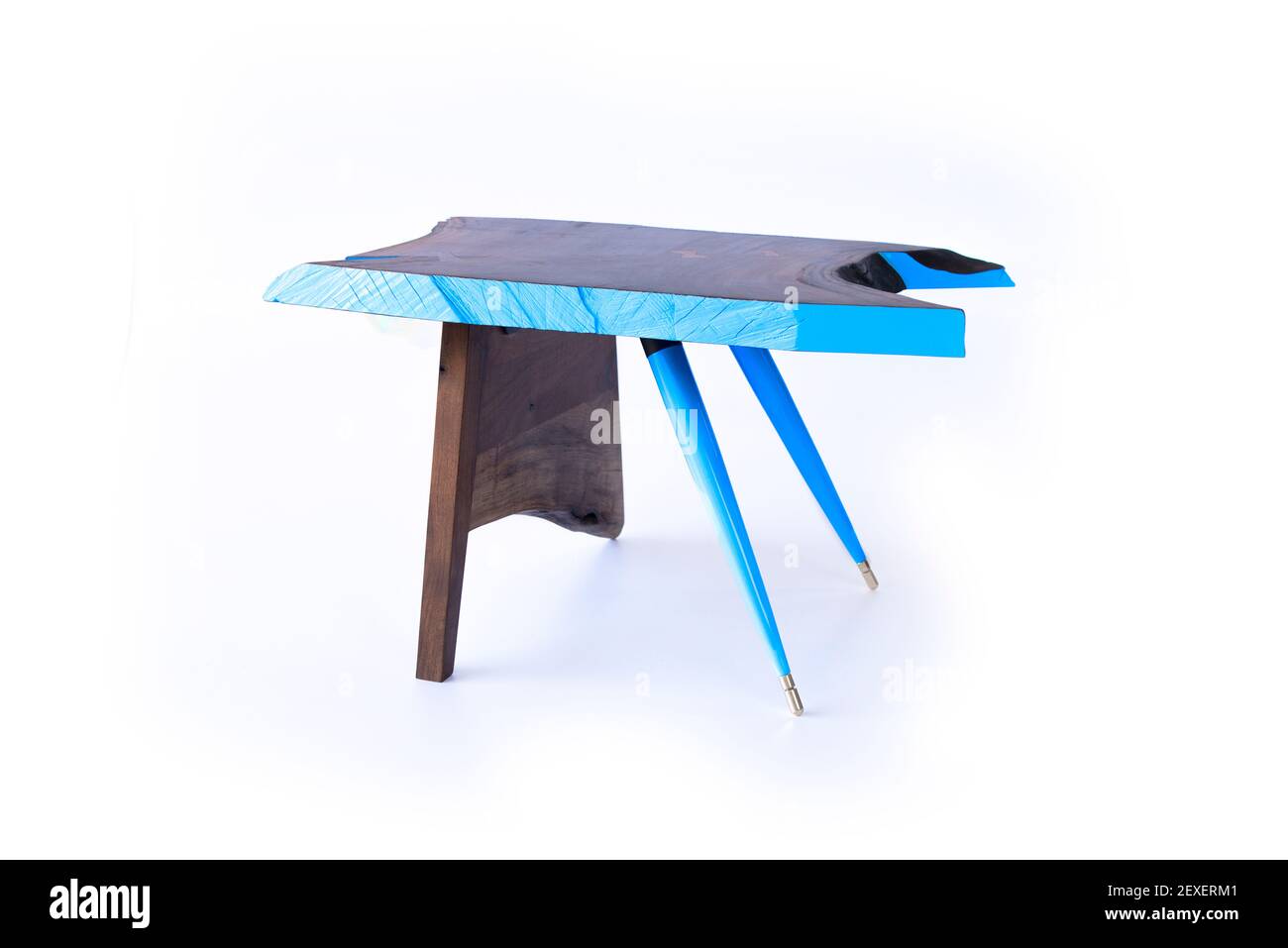 Luxurious handmade table on a white background, side view Stock Photo ...