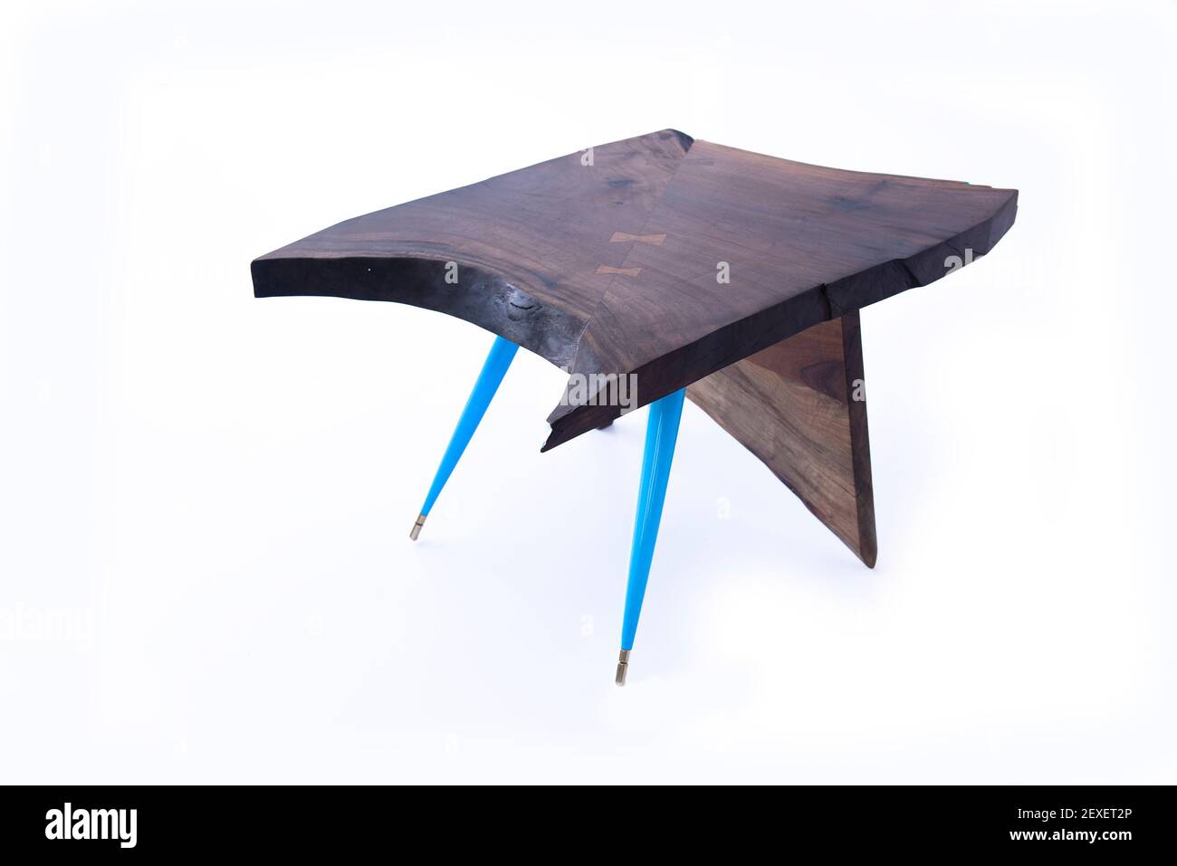 Luxurious handmade table on a white background, side view Stock Photo ...