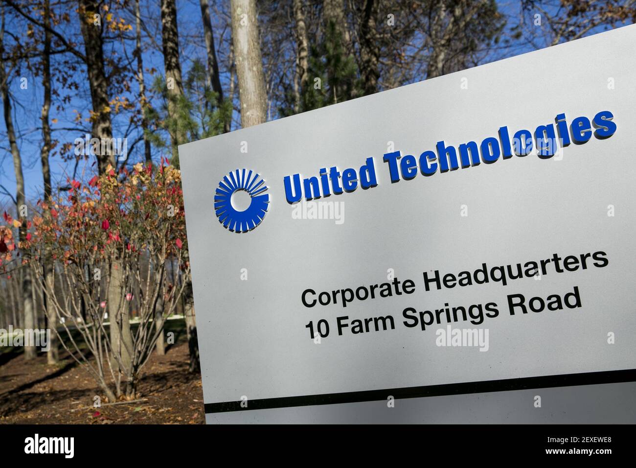 A logo sign outside of the headquarters of the United Technologies ...